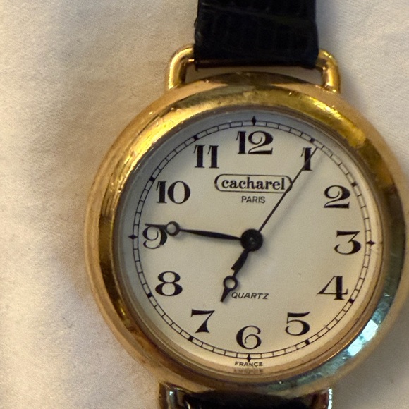 Cacharel | Jewelry | Cacharel Gold And Black Watch | Poshmark
